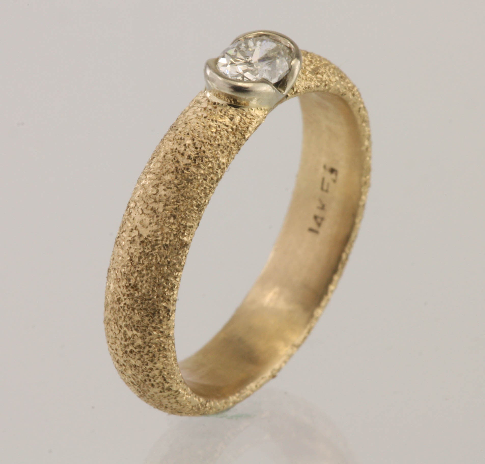 Oval Diamond In 14kt Partial Bezel Ring - Pyramid Studios